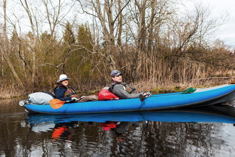 Two Men is Kayaking on the River. Stock Photo - Image of khaki, hiking ...