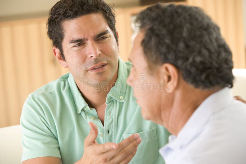 Two Men in Living Room Arguing Stock Image - Image of hispanic, head ...