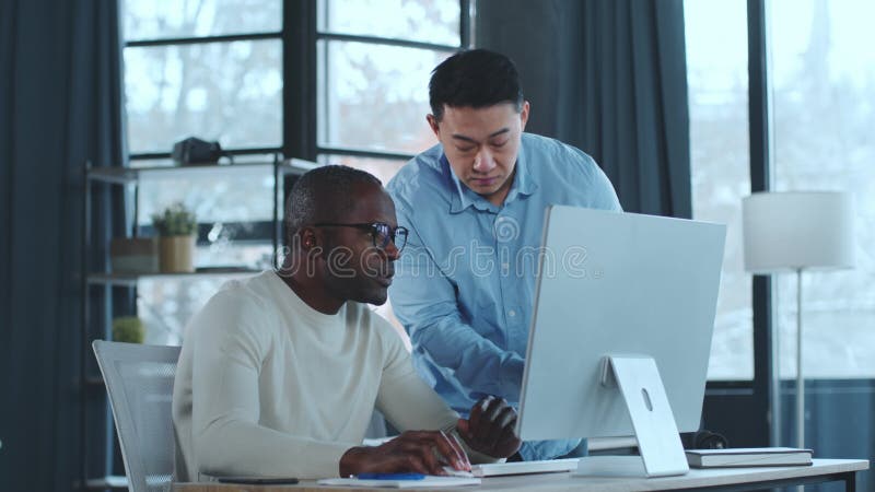 Two Men Looking at Computer Screen Stock Footage - Video of data ...