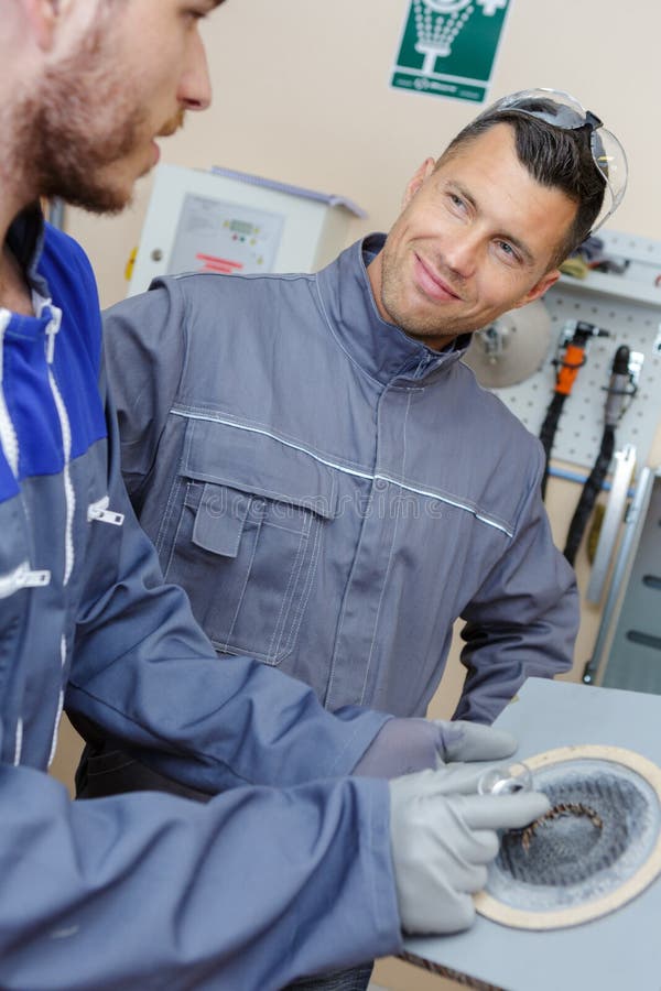 Two Men on Machine Processes Metal Detail Stock Image - Image of worker ...