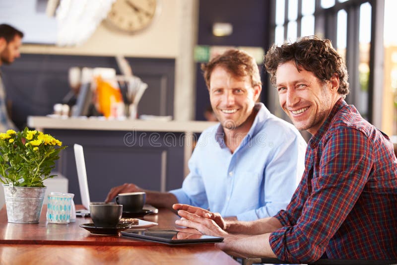 Two Men Meeting at a Coffee Shop, Portrait Stock Image - Image of ...