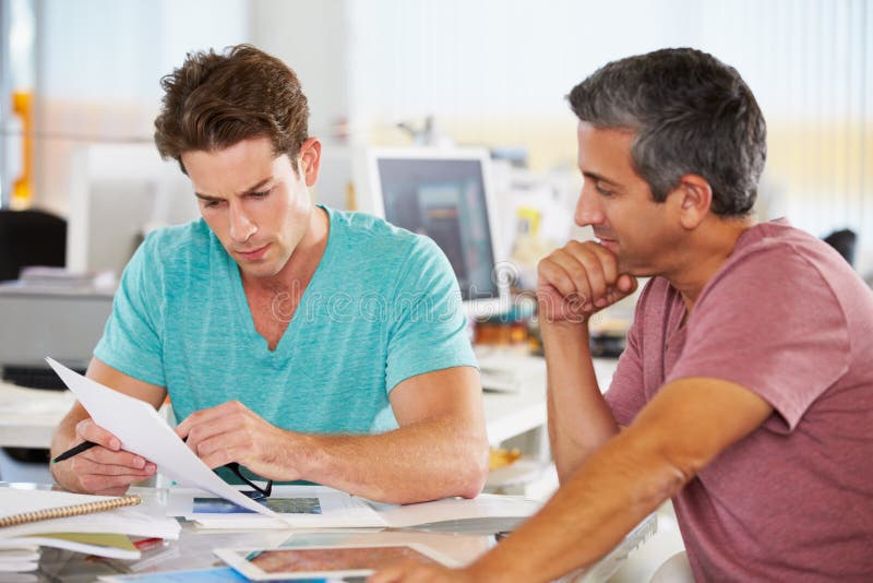 Two Men Meeting in Creative Office Stock Image - Image of discussing ...