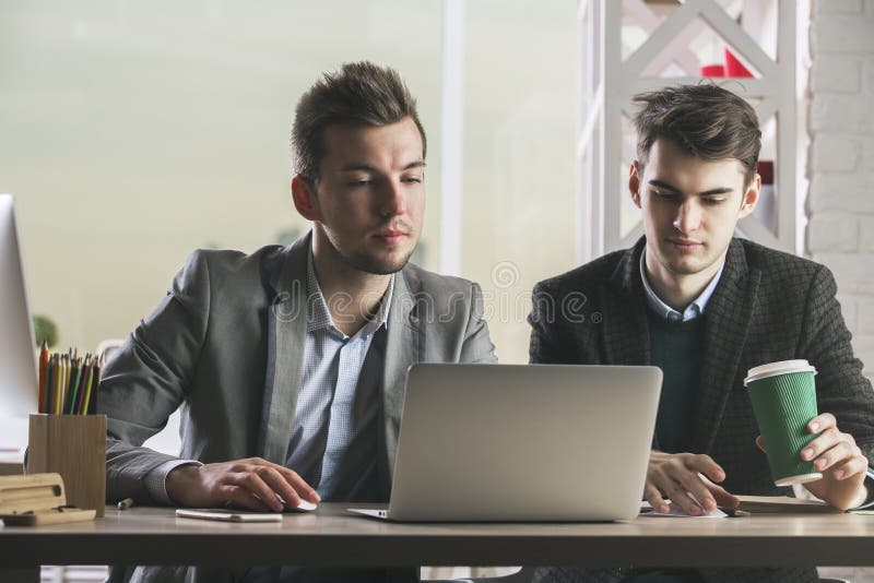 Two men in office stock image. Image of items, occupation - 89664791