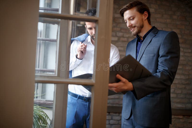 Two Men in Office Talking about Work Stock Image - Image of firm ...