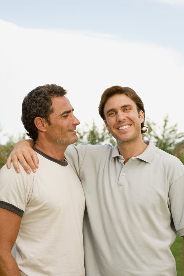 Two men outdoors stock image. Image of american, multi - 62559949