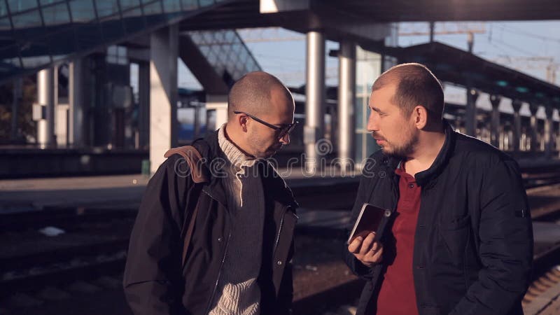 Two Men on the Platform of the Railway Station Waiting for the Arrival ...