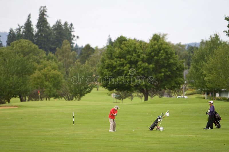 Two Men Playing Golf - Horizontal Stock Image - Image of caucasian ...