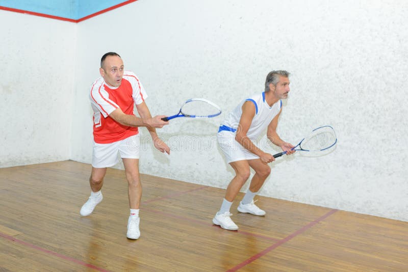 Two men playing squash stock photo. Image of adult, caucasian - 130822002
