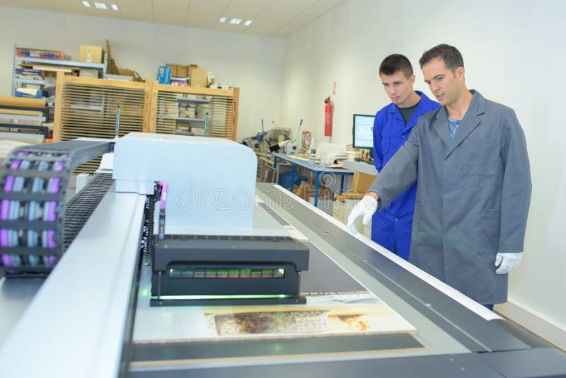 Two Men in Professional Printing Works Stock Image - Image of poster ...