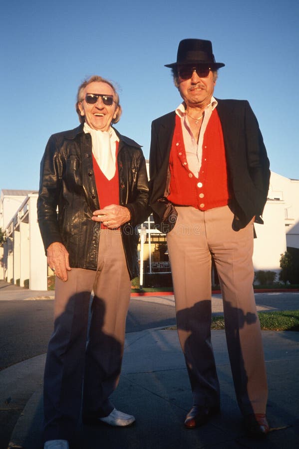 Two Men in Red Vests Taking a Walk in Santa Monica, CA Editorial Stock ...