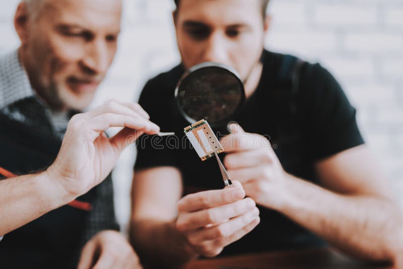Two Men Repairing Hardware Equipment from PC Stock Image - Image of ...