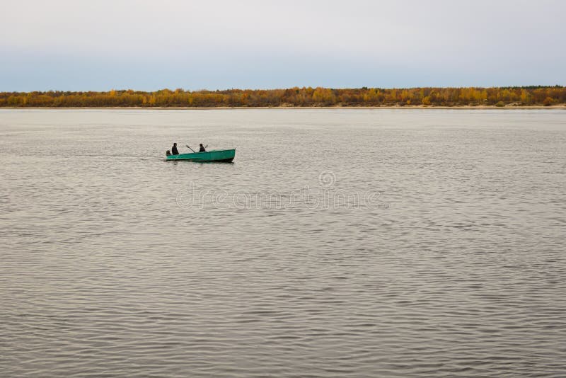 Two Men in a Rowing Boat Float Along the River Stock Image - Image of ...