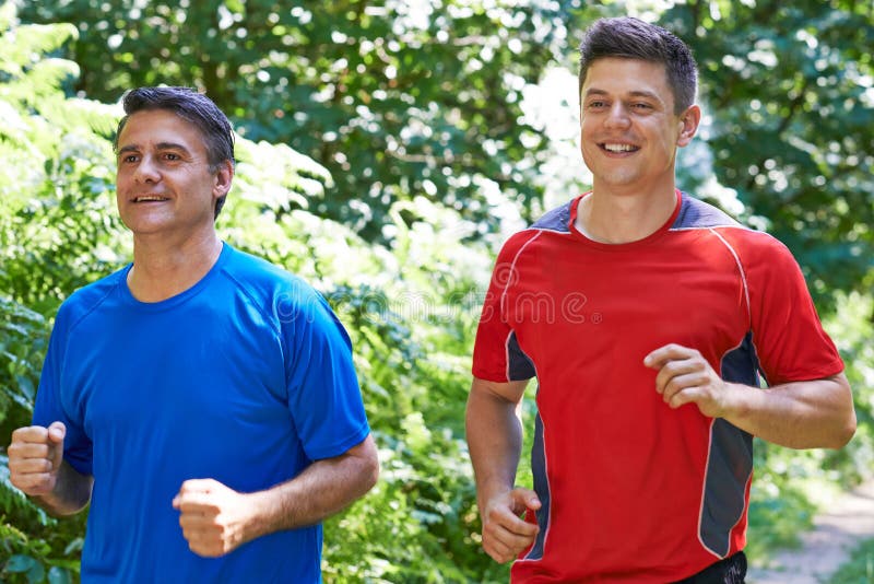 Two Men Running Stock Photos - Download 13,131 Royalty Free Photos