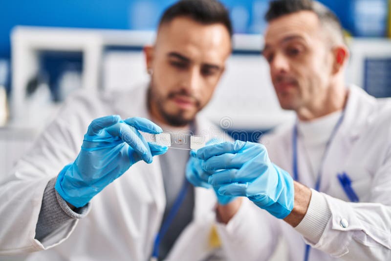 Two Men Scientists Looking Sample at Street Stock Image - Image of ...