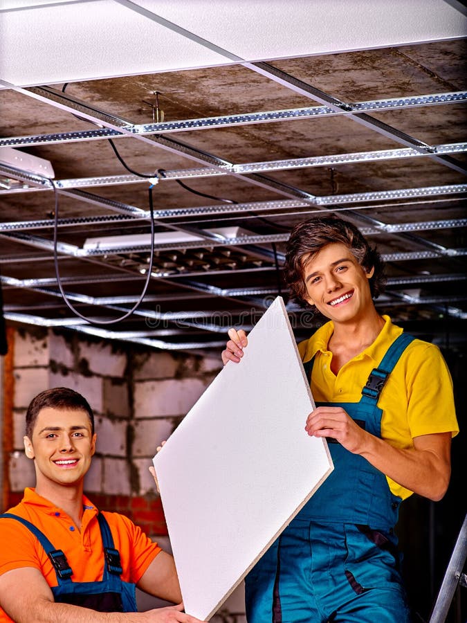 The Two Men Set a False Ceiling. Stock Image - Image of decor ...