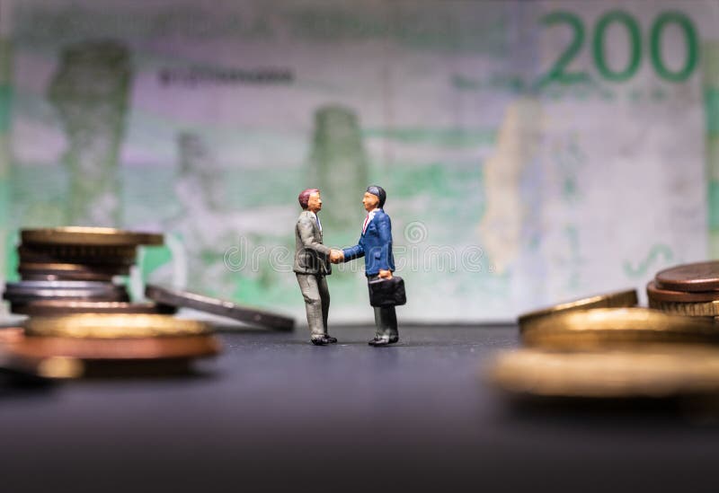 Two Men Shaking Hands in Front of a Large Bank Note.. Stock Photo ...