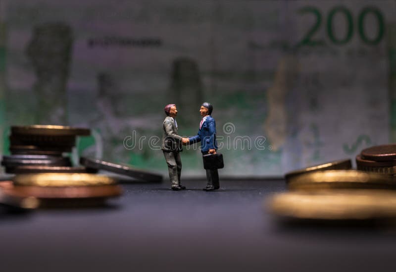 Two Men Shaking Hands in Front of a Large Bank Note.. Stock Photo ...