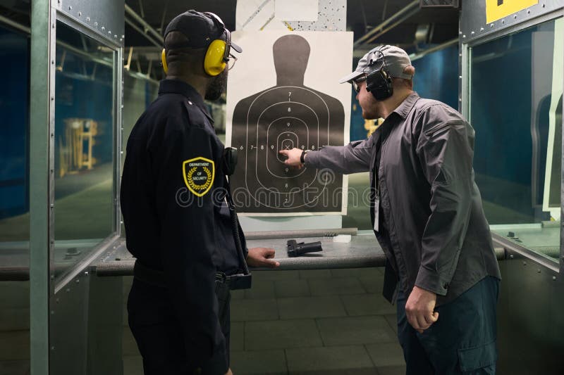 Observing Firearm Shooting Practice at Indoor Range Stock Photo - Image ...