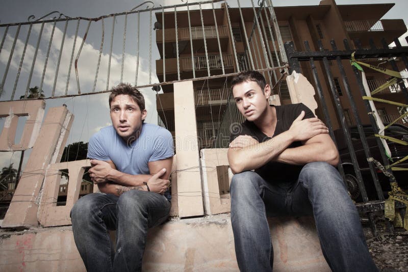 Two Men Sitting in the Cold Stock Image - Image of shivering, outdoors ...