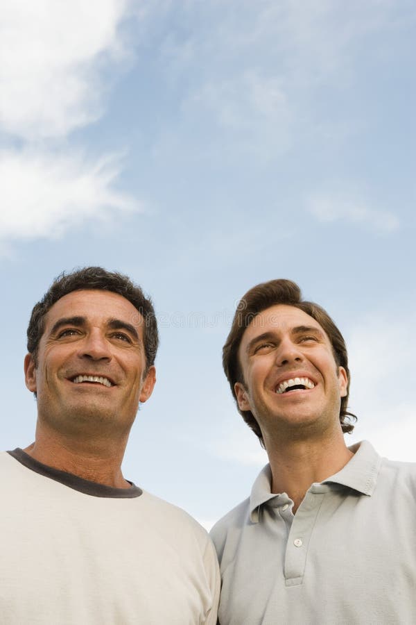 Two men smiling stock image. Image of caucasian, family - 62560679