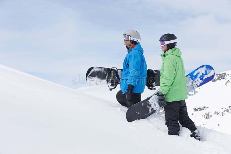 Two Men with Snowboards on Ski Holiday in Mountains Stock Image - Image ...
