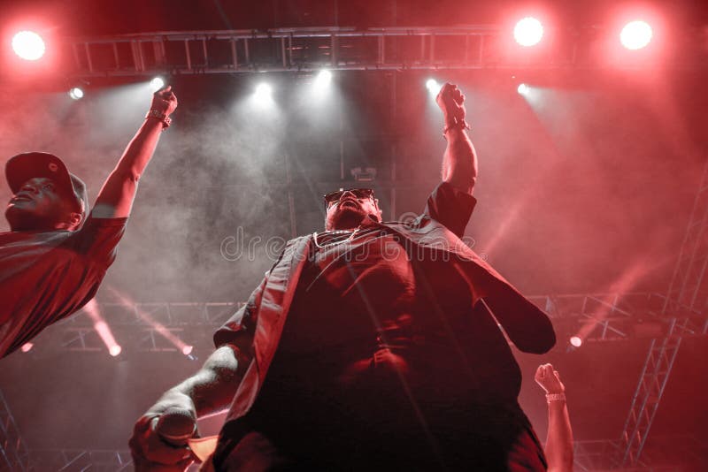 Two Men Standing Raising Right Hands Stock Image - Image of light ...