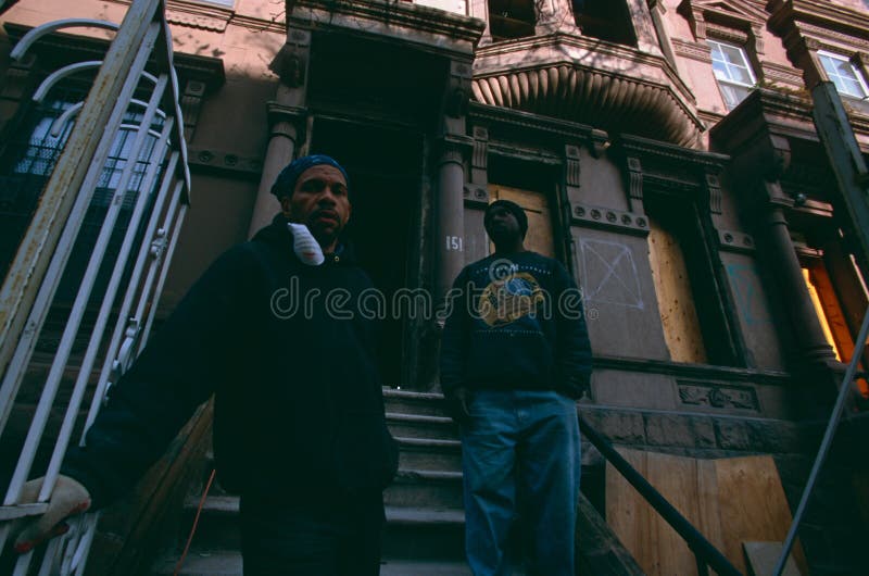Two Men Standing on the Steps of a Building, New York City Editorial ...