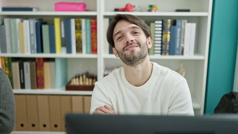 Two Men Students Using Computer Reading Book Studying at Library ...
