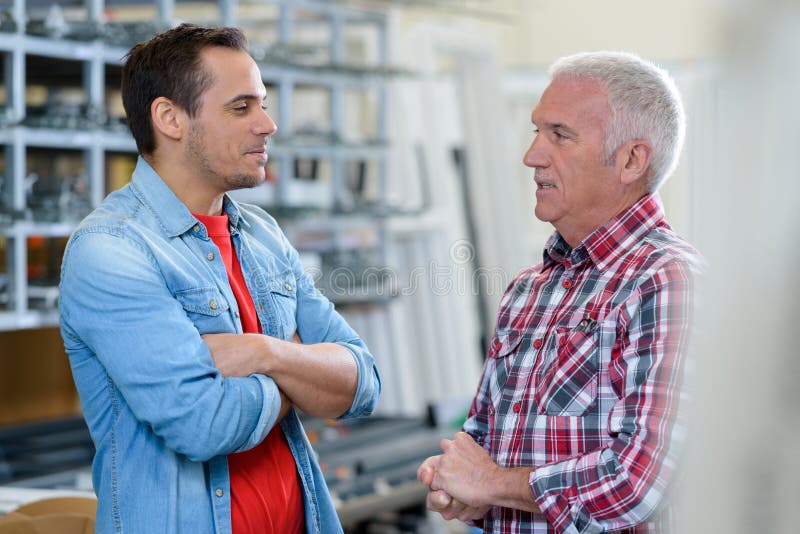 Two Men Taking in Warehouse Stock Image - Image of delivery, advisor ...