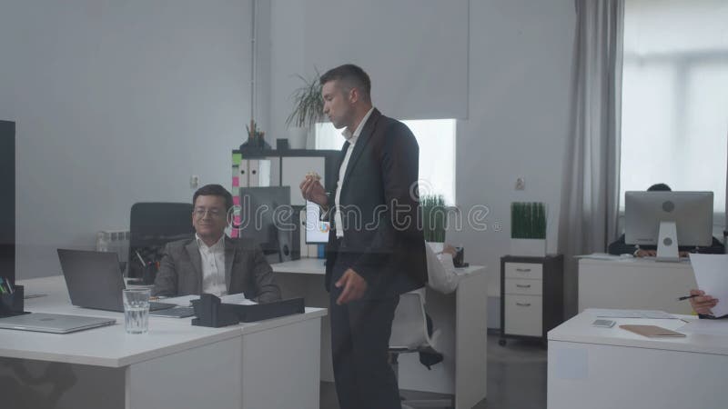 Collegues Discuss Something at the Office. Two Men Stock Photo - Image ...