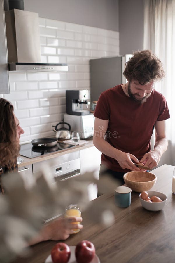 Two Men Talking in the Kitchen Stock Image - Image of communication ...