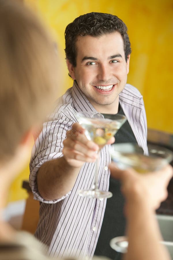 Two Men Toast with Martinis Stock Photo - Image of buddy, cheers: 21727992