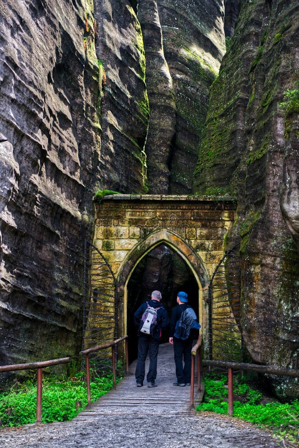Two Men Tourists Standing in Front of a Gate in the Rocks in `Adrspach ...