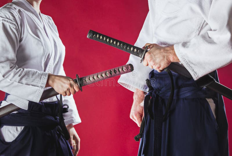 Man Pulling Sword stock photo. Image of longsword, culture - 3841900