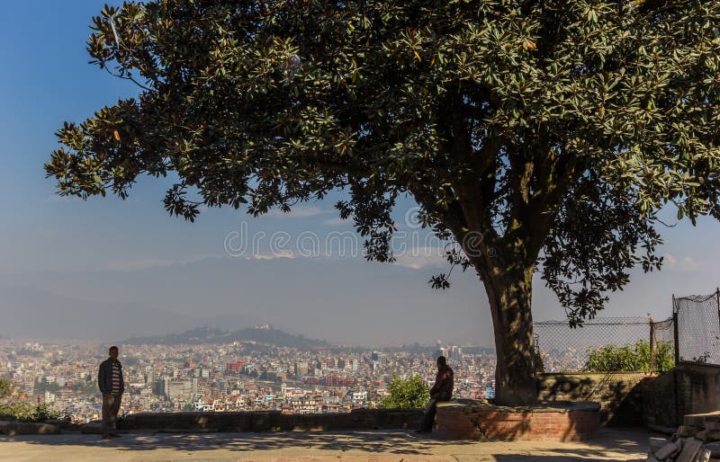Two Men Under a Tree with View Over Kathmandu in Kirtipur Editorial ...