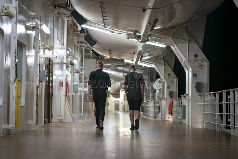 Two Men Walking on a Cruise Ship Deck Editorial Image - Image of casual ...