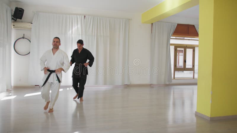 Two Men are Walking into the Hall for a Karate Lesson Stock Footage ...