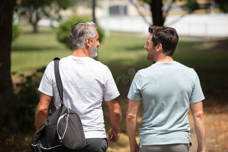 Two Men Walking after Jogging Stock Photo - Image of training, outdoor ...