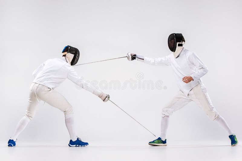 2 People Fighting With Swords