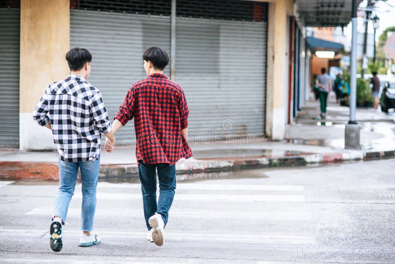 Two Men Who Love Each Other Hold Hands and Walk Together Stock Image ...