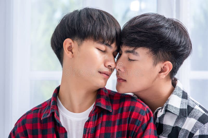 Two Men Who Love Each Other Hug from Behind Another Stock Image - Image ...