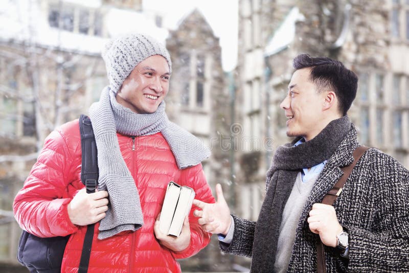 Two Men in Winter Clothes Talking Stock Photo - Image of coat, cheerful ...