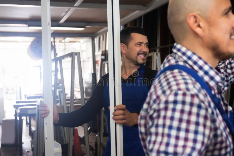 Two Men Work at PVC Windows Factory Stock Photo - Image of coverall ...