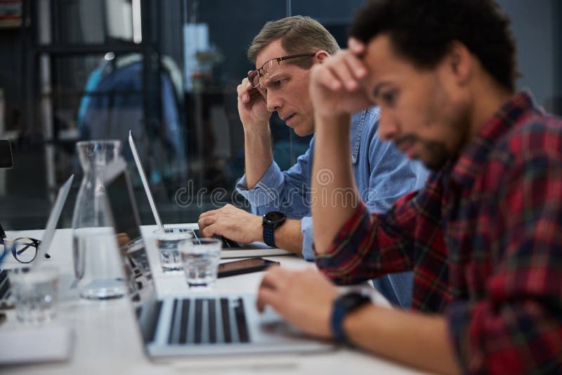 Two Men Working on Notebooks in Office Stock Photo - Image of ... Two Men Working on Notebooks in Office Stock Photo - Image of ...