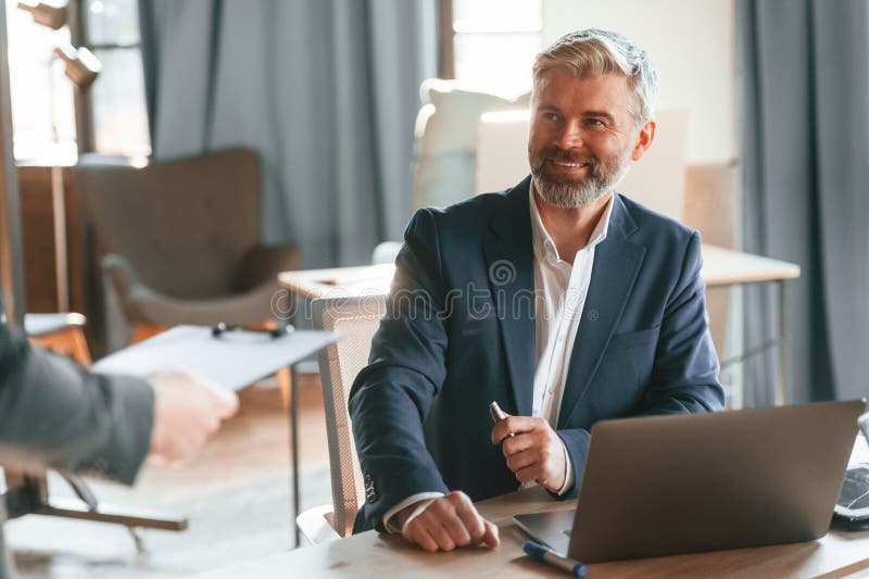 Two Men is Working on the Project. Business People are Together in the ...