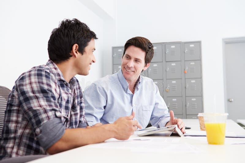 Two Men Working Together in Design Studio Stock Photo - Image of ...