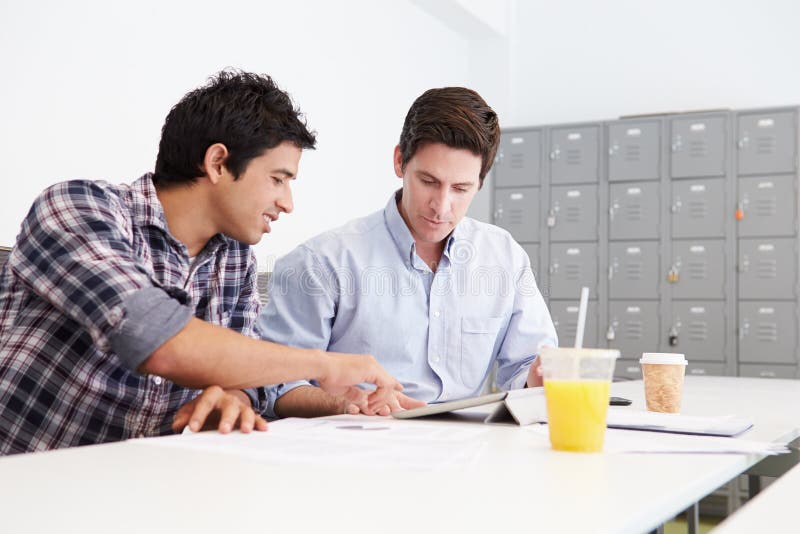 Two Men Working Together in Design Studio Stock Photo - Image of ...