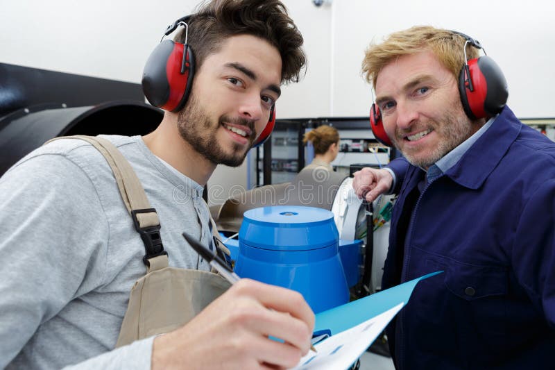 Two Men in Workwear in Workshop Stock Image - Image of protective ...