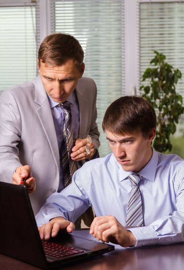Two Men - Young and Mature To Discuss the Issue. Stock Image - Image of ...