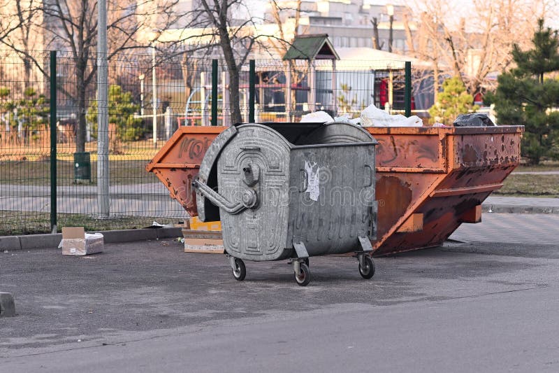 Two Metal Garbage Cans. Unsorted Garbage. Outdoor. Stock Image - Image ...